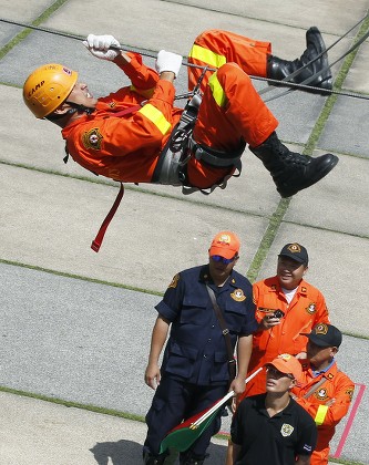 Thai Fireman Climbs On Sling During Editorial Stock Photo - Stock Image ...