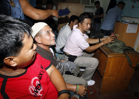 Filipino Men Who Were Apprehended By Editorial Stock Photo - Stock ...