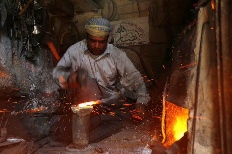 Yemeni Blacksmith Works Hot Iron Inside Editorial Stock Photo - Stock ...