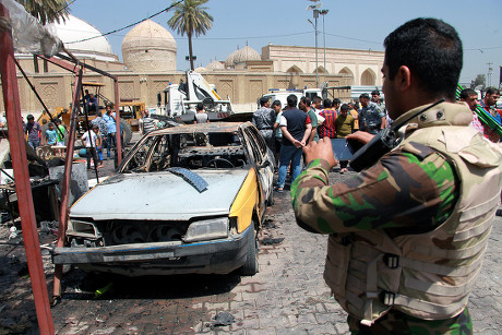 Iraqi Policeman Inspects Site Car Bomb Editorial Stock Photo - Stock ...
