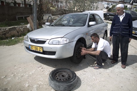 Palestinian Man Replaces Flat Tire East Editorial Stock Photo - Stock ...