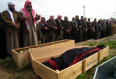 Iraqi Sunni Men Pray Next Coffins Editorial Stock Photo - Stock Image ...