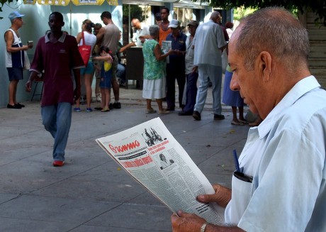 Cuban Man Reads Official Newspaper Granma Editorial Stock Photo - Stock ...
