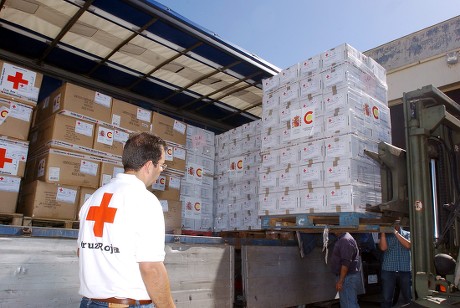 Red Cross Members Load Humanitarian Aid Editorial Stock Photo - Stock ...