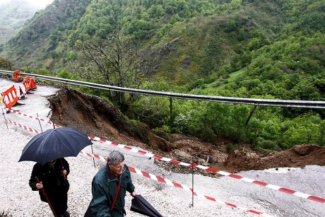Two People Walk Past Huge Hole Editorial Stock Photo - Stock Image ...