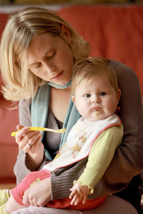 Model Released Mother Spoon Feeding Her Editorial Stock Photo - Stock ...