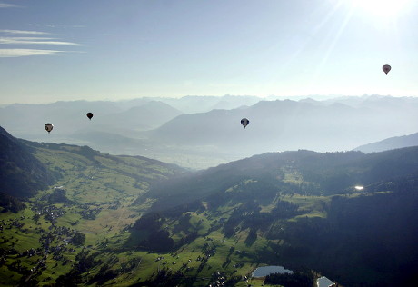 Hot Air Balloons Float Over Swiss Editorial Stock Photo - Stock Image ...