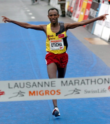 Ethiopian Tesfaye Eticha Crosses Finishing Line Editorial Stock Photo ...