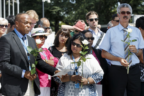 Un Staff Members Hold Roses While Editorial Stock Photo - Stock Image ...