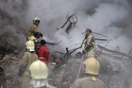 Iranian Firefighter Sprays Water Rubble Plasco Editorial Stock Photo ...
