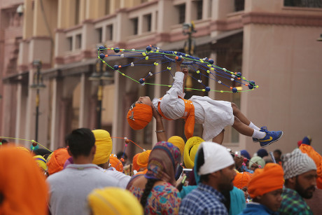 Young Sikh Boy Held By Man Editorial Stock Photo - Stock Image ...