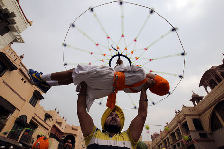 Young Sikh Boy Held By Man Editorial Stock Photo - Stock Image ...