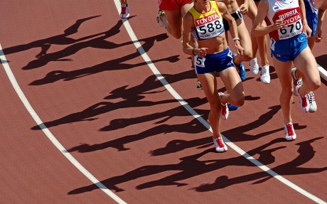 Runners Shadowed On Track During 3rd Editorial Stock Photo - Stock ...