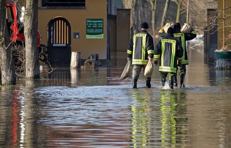Firefighter Carries Sandbags Through Flood Waters Editorial Stock Photo ...