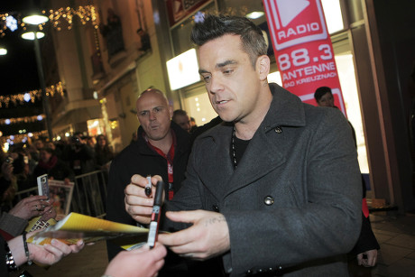 British Singer Robbie Williams Signs Autographs Editorial Stock Photo ...