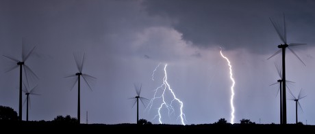 Lightning Strikes Behind Wind Turbines Near Editorial Stock Photo ...