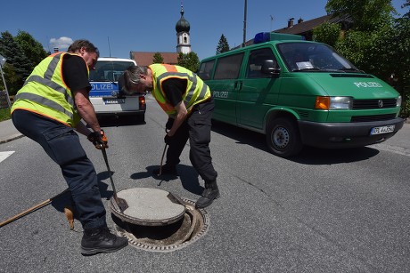 Police Officers Inspect Weld Manhole On Editorial Stock Photo - Stock ...