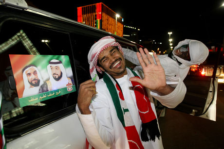 Emirati Man Smiles By Poster On Editorial Stock Photo - Stock Image ...
