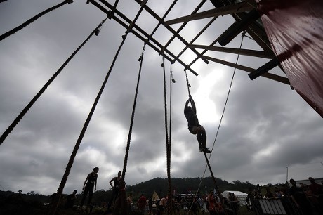 Participant Climbs Rope During Spartan Race Editorial Stock Photo ...