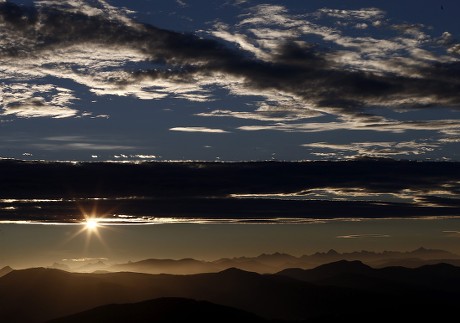 Rising Sun Creates Dramatic Scene By Editorial Stock Photo - Stock ...