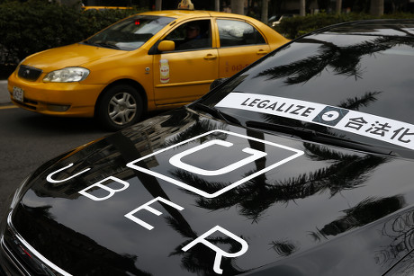Uber Driver Maneuvers On Street During Editorial Stock Photo - Stock ...