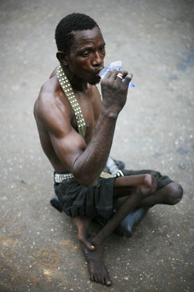 Polio Victim Takes Drink On Break Editorial Stock Photo - Stock Image ...