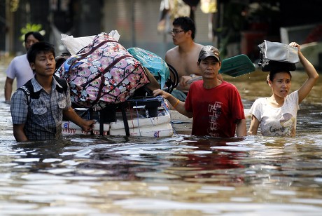 Thai Residents Wade Through Floodwaters On Editorial Stock Photo ...