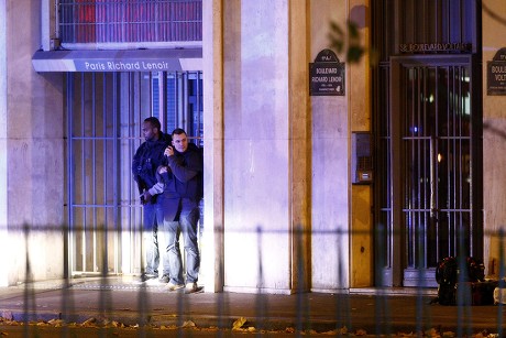 French Police Officers Take Cover Outside Editorial Stock Photo - Stock ...
