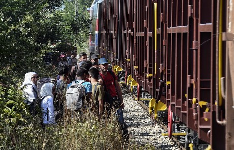 Freight Train Passes Next Migrants Who Editorial Stock Photo - Stock ...
