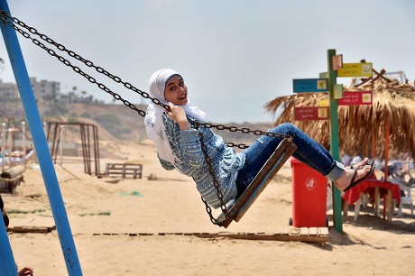 Syrian Refugee Girl Rides On Swing Editorial Stock Photo - Stock Image ...