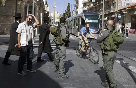 Ultraorthodox Jews Walk Past Armed Israeli Editorial Stock Photo ...