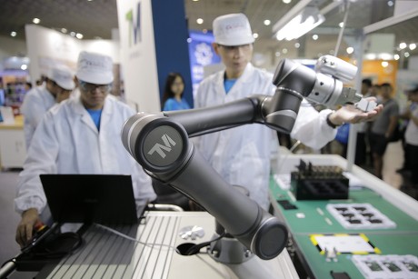 Exhibitors Demonstrate Robotic Arm During Taiwan Editorial Stock Photo ...