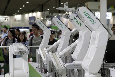 People Watch Robotic Arms Demonstration During Editorial Stock Photo ...