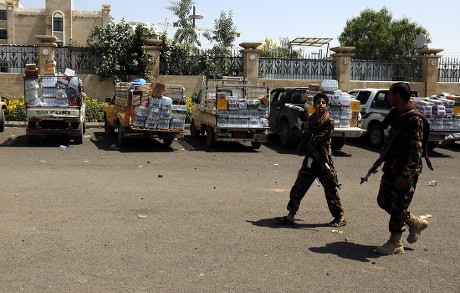 Armed Houthi Militiamen Walk Past Vehicles Editorial Stock Photo ...