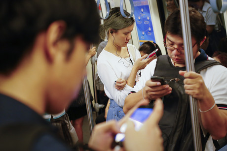 Thai Commuters Use Their Mobile Phones Editorial Stock Photo - Stock ...