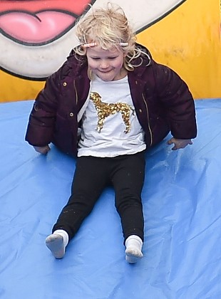 Isla Phillips On Bouncy Castle Editorial Stock Photo - Stock Image ...