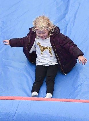 Isla Phillips On Bouncy Castle Editorial Stock Photo - Stock Image ...