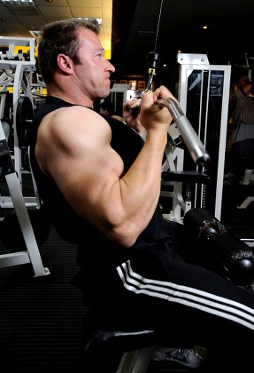 Bodybuilder Gunter Schlierkamp Demonstrates Lifting Technique Editorial ...