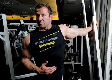 Bodybuilder Gunter Schlierkamp Demonstrates Stretching Technique ...