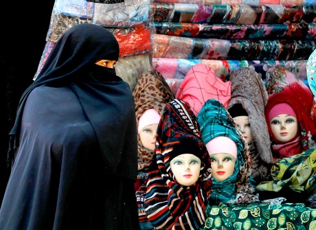 Burqa Clad Yemeni Woman Passes Mannequins Editorial Stock Photo - Stock ...