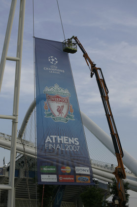 Worker On Crane Hoists Banner Ahead Editorial Stock Photo - Stock Image ...