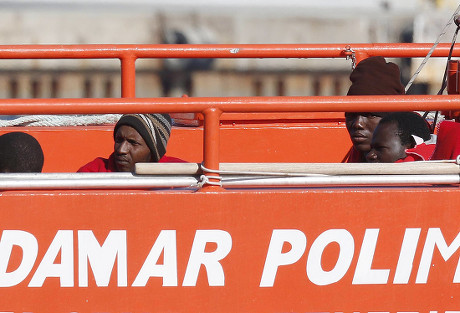 Seveal Subsaharan Men Sit On Deck Editorial Stock Photo - Stock Image ...