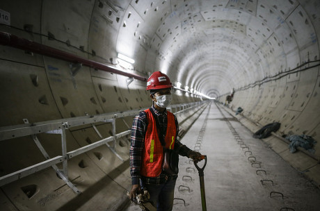 Indonesian Laborer Takes Break Inside Underground Editorial Stock Photo ...