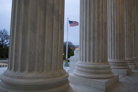 Dawn Us National Flag Behind Corinthian Editorial Stock Photo - Stock ...