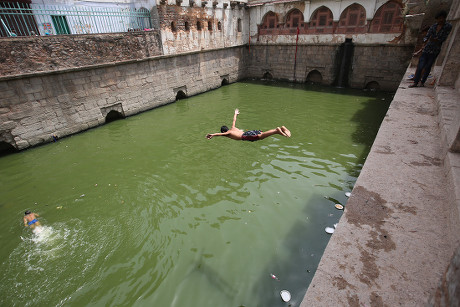 Indian Boy Dives Into Baoli Stepwell Editorial Stock Photo - Stock Image | Shutterstock
