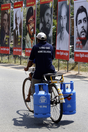 Gas Delivery Man Cycles His Bike Editorial Stock Photo - Stock Image ...