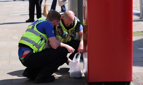 Two Police Officers Examine Unattended Package Editorial Stock Photo ...