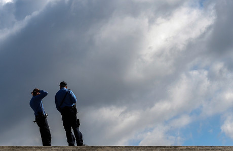 Police Officers On Guard On Rooftop Editorial Stock Photo - Stock Image ...