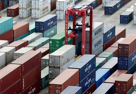 Container Carrier Maneuvers Between Lines Containers Editorial Stock ...