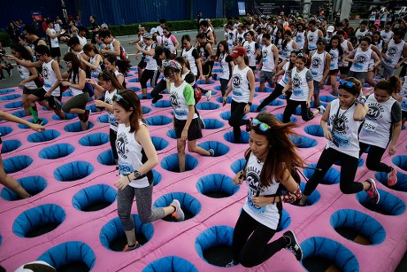 Participants Run Through Obstacle Course During Editorial Stock Photo - Stock Image | Shutterstock